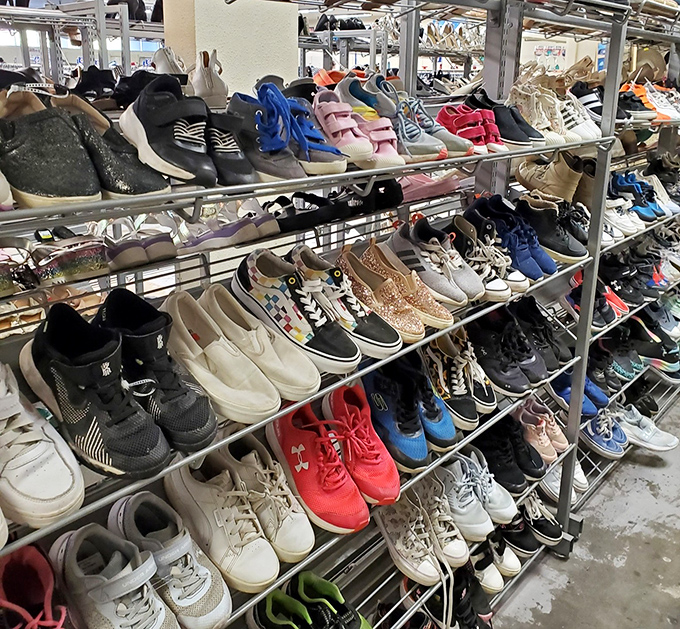 Footwear fantasies come true in these metal racks. From barely-worn sneakers to vintage loafers, there's a Cinderella moment waiting for every foot.