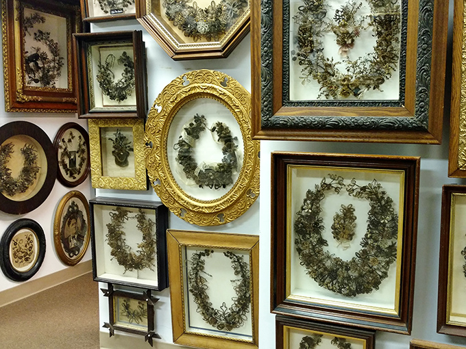 A gallery of framed follicular masterpieces. Each piece represents hours of painstaking work and a deeply personal connection to loved ones.