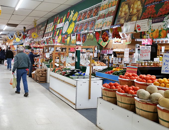 Farm-fresh produce arranged with pride. These tomatoes didn't travel further than you did to get here, and they look all the better for it.