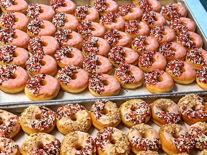 A battalion of pink-frosted soldiers with sprinkle decorations, standing at attention and ready for duty in your breakfast lineup.