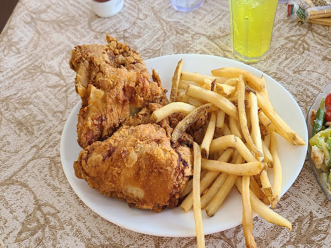Broasted chicken so perfectly golden, it deserves its own Instagram account. Those crispy edges are what dreams are made of.