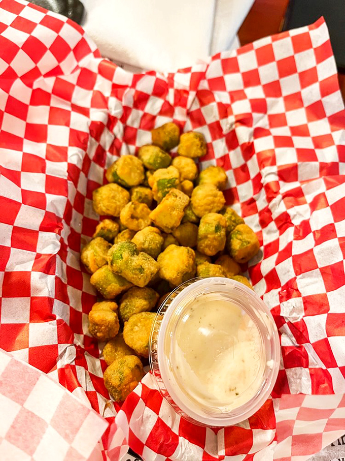 Fried okra that defies the vegetable's slimy reputation, transformed into addictive, pop-in-your-mouth nuggets of Southern comfort.