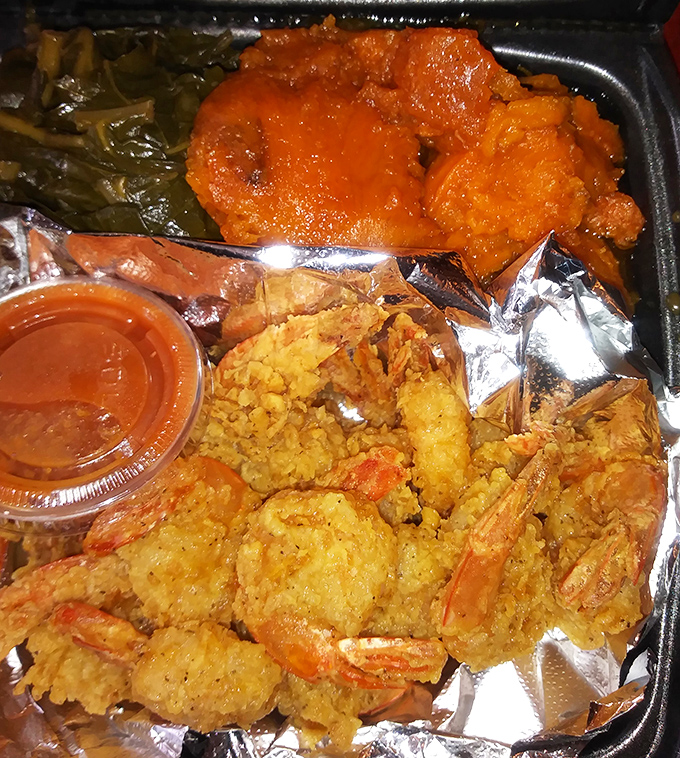 Fried shrimp nestled in seasoned perfection, making every bite feel like a coastal vacation for your mouth.