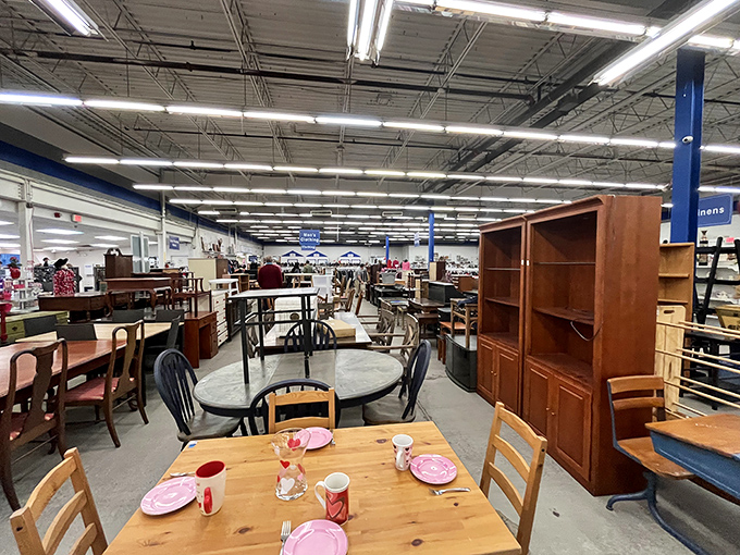 Dining sets staged with plates make you imagine the family dinners they'll host in their new homes. Every table tells a potential story.