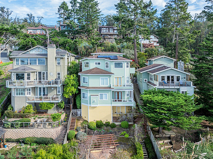 Coastal living, stacked like a delicious layer cake. These homes cling to hillsides, each competing for the best morning coffee view in California. 
