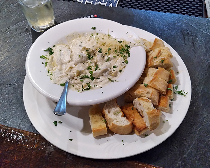 This hot crab dip disappears faster than your willpower at an all-you-can-eat buffet.