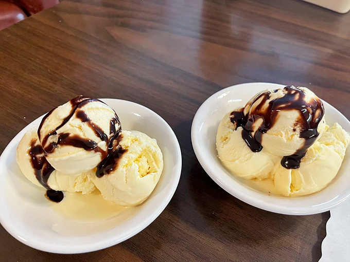 Vanilla ice cream crowned with chocolate sauce, because even seafood lovers deserve sweet happy endings.