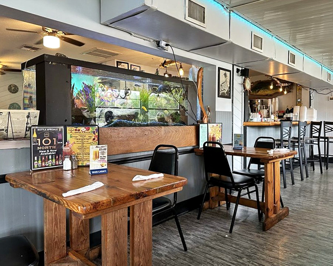 The dining room's fish tank and wooden tables create that rare atmosphere where both your inner child and sophisticated palate feel equally at home.