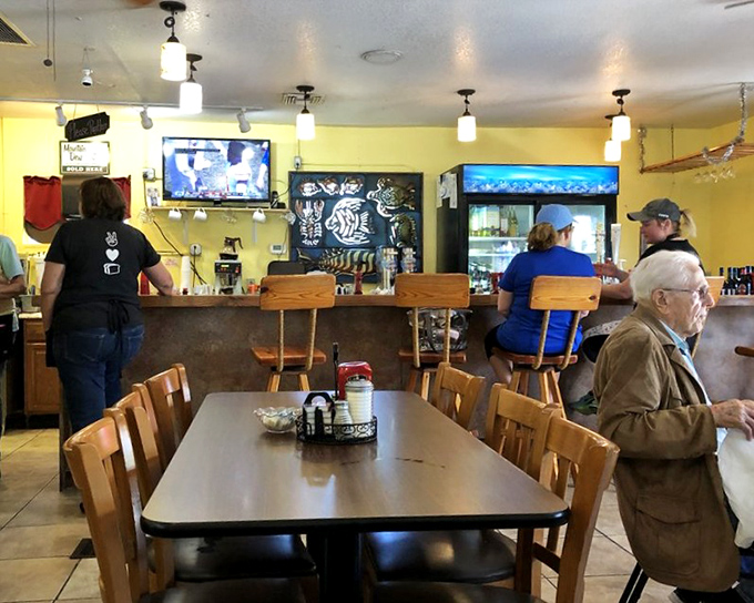 The dining room where locals gather, conversations flow, and the aroma of home cooking makes you feel like you've discovered Florida's living room.