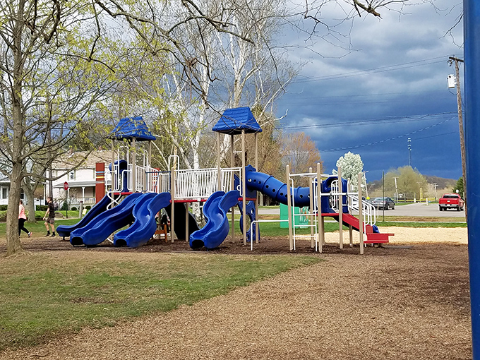 Primary colors and twisting slides&mdash;this playground hasn't been updated to look like a minimalist art installation, and that's precisely its charm.