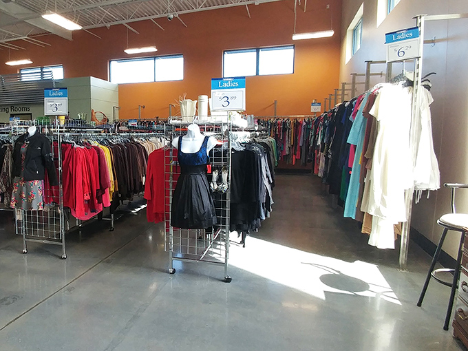 The ladies' section, meticulously organized by color and size, where that little black dress with the original tags is playing hard to get.