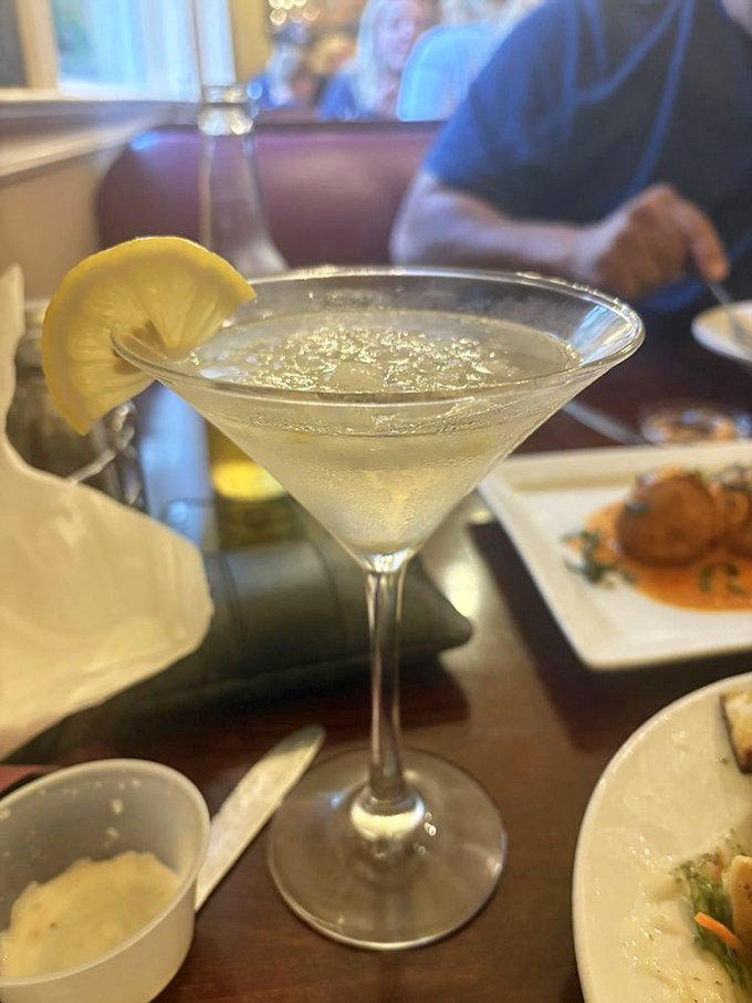 A lemon martini that sparkles like morning dew, offering a refreshing counterpoint to the hearty Italian fare that awaits.