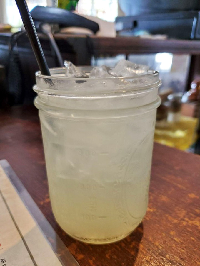 Mason jar lemonade&mdash;because proper Southern refreshment demands proper Southern glassware. This isn't just a drink; it's air conditioning in a glass.