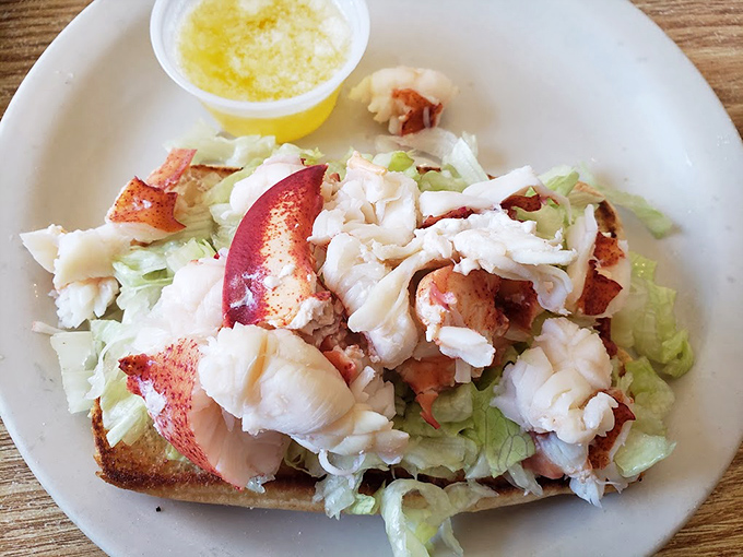 This lobster roll doesn't play games &ndash; just sweet chunks of lobster meat nestled on crisp lettuce, letting the star of the show shine.