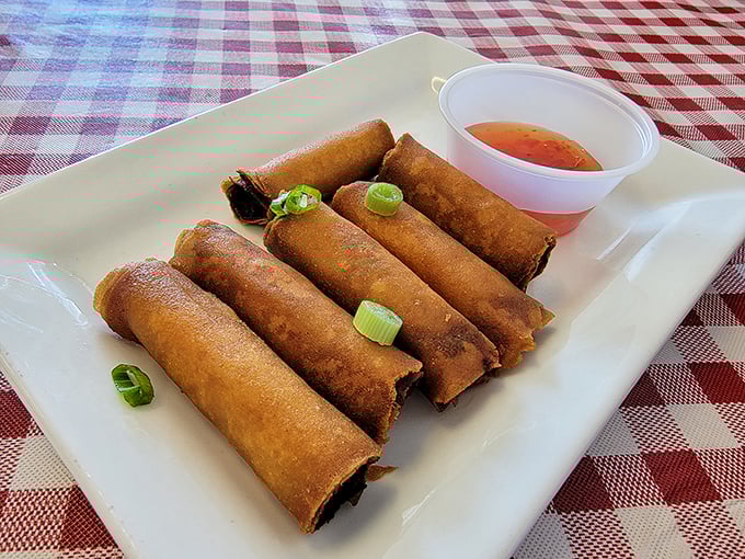 Lumpia: proof that the best things in life are crispy, cylindrical, and come with dipping sauce on the side.
