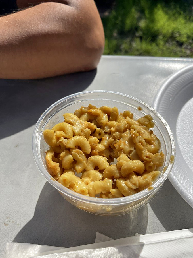 Mac and cheese this golden should come with its own spotlight &ndash; it's practically glowing with dairy perfection.