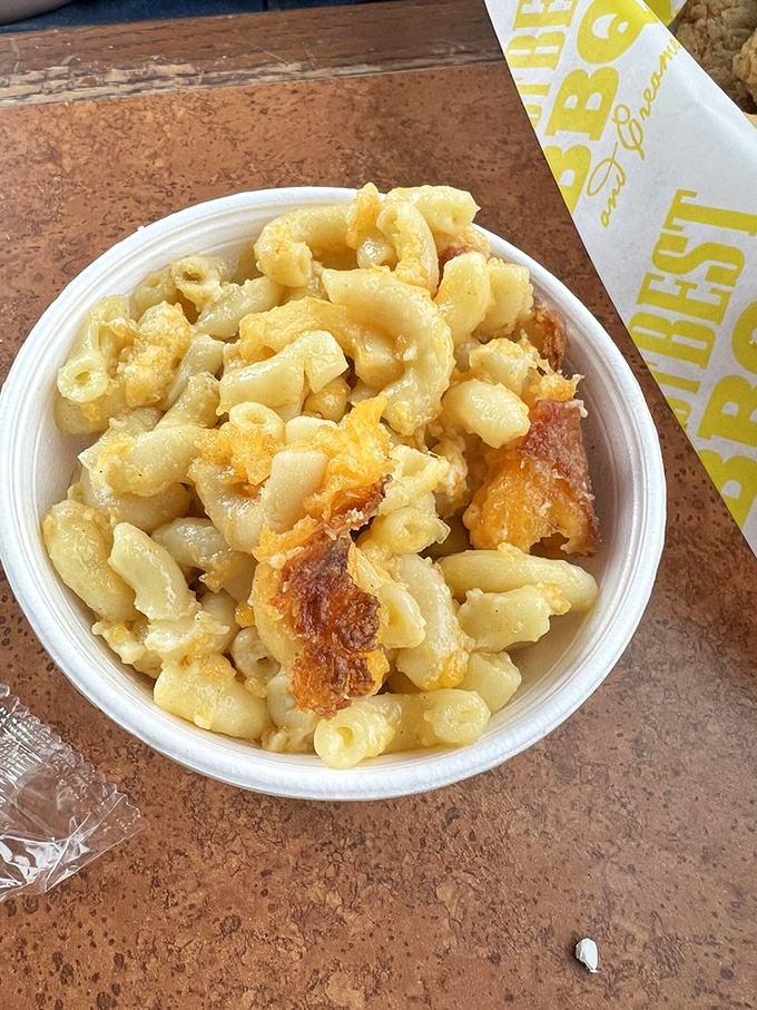Mac and cheese that achieves the impossible trifecta: creamy, cheesy, and with those crispy edges that food dreams are made of.