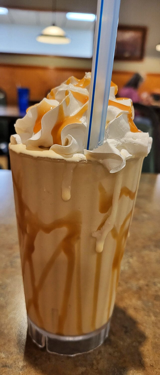 This isn't just a milkshake&mdash;it's a drinkable dessert masterpiece. Caramel cascades down whipped cream mountains like nature intended in the dessert world.