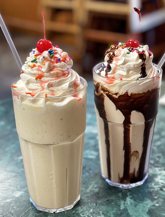 These towering milkshakes topped with whipped cream and cherries bring out the kid in every adult diner.