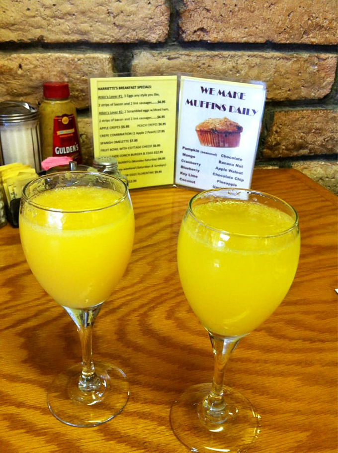 Fresh mimosas served in proper wine glasses elevate breakfast to celebration status, Keys-style sophistication included.