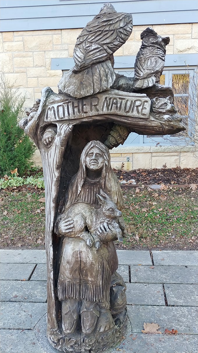 Not your average park decoration! This "Mother Nature" sculpture captures the spirit of the land with more personality than you'd expect from a chunk of wood.