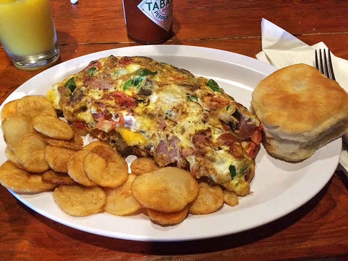Even breakfast gets the hearty treatment here, with omelets that could fuel a construction crew through lunch.