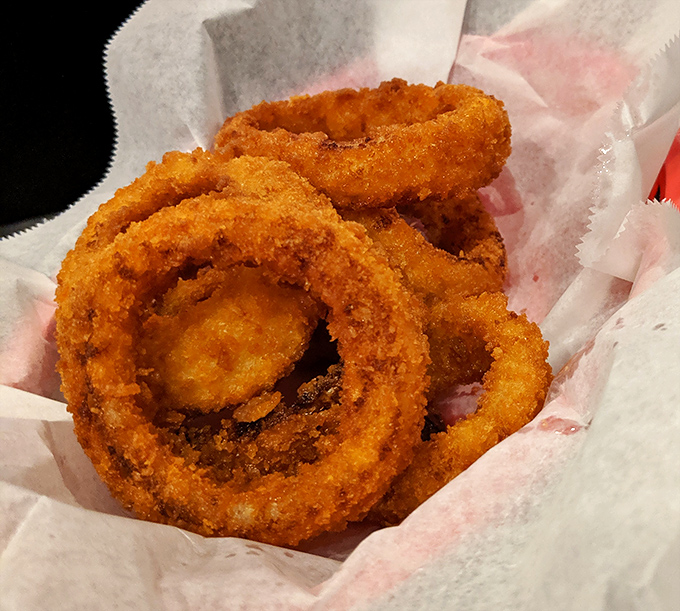 Golden halos of onion ring perfection. These crispy circles of joy make regular onions wonder where they went wrong in life.