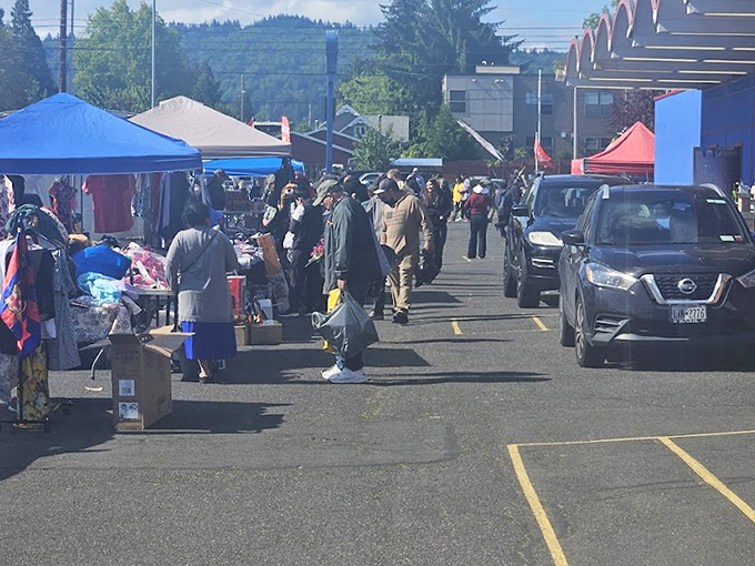 A colorful patchwork of tents creates a temporary marketplace village. The thrill of the hunt brings strangers together in shared pursuit.