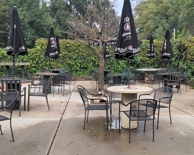 The outdoor patio &ndash; where summer brunches stretch into afternoon conversations under umbrellas that have witnessed countless "just one more coffee" promises.