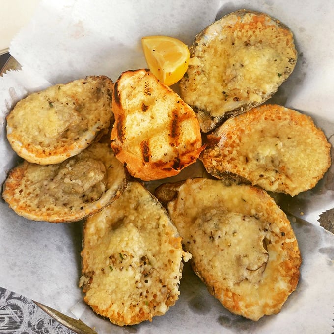 Golden halos of seafood perfection. These chargrilled oysters aren't just appetizers&mdash;they're little miracles that could convert even the most stubborn oyster skeptic.