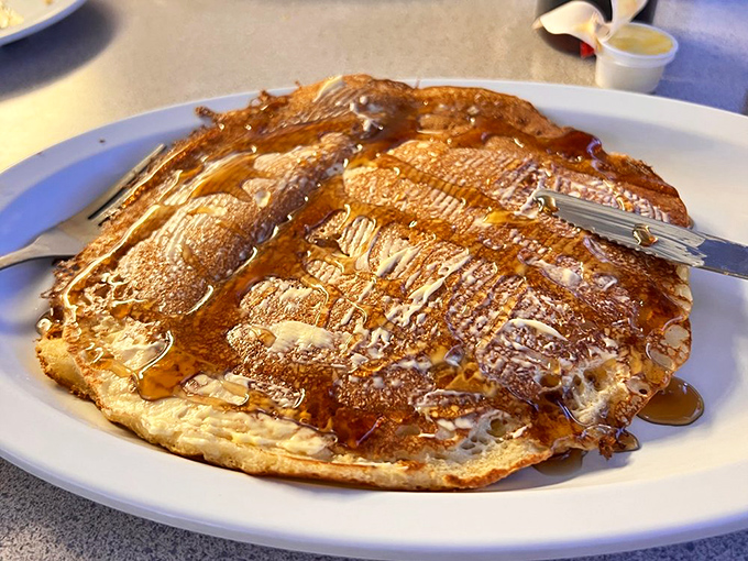 Pancake perfection is measured in golden-brown real estate and syrup absorption capacity. This one scores a perfect 10 on both counts.