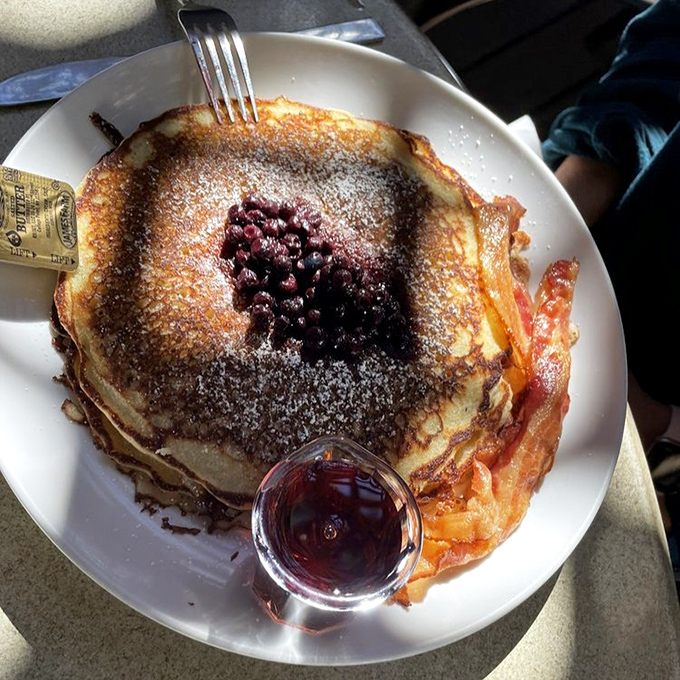 Pancakes that make you question why we don't eat breakfast for every meal. Those berries aren't garnish&mdash;they're little purple jewels of joy.