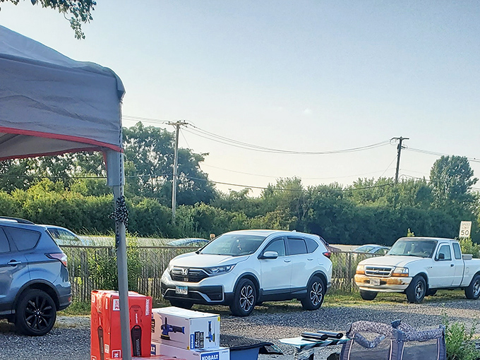 Early morning setup reveals the behind-the-scenes preparation as vendors position their wares for maximum visibility and customer appeal.