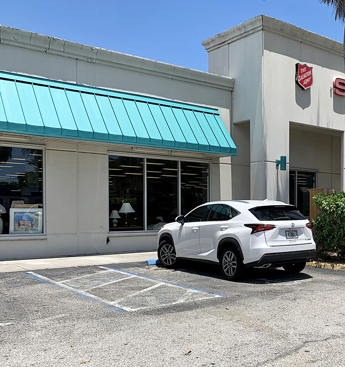 Even luxury vehicles make pilgrimages to this temple of thrift. The teal awnings beckon shoppers from all economic backgrounds.