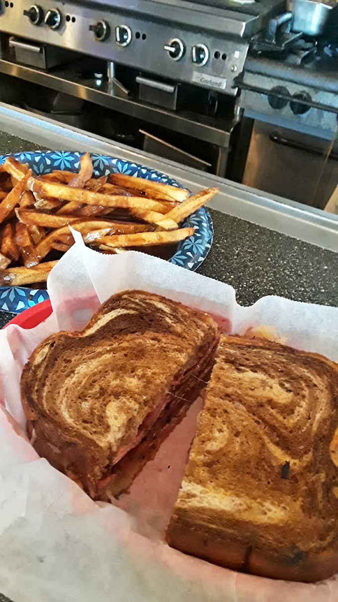 This grilled sandwich with fries isn't just lunch &ndash; it's edible therapy after a long morning, with melted cheese as the counselor.
