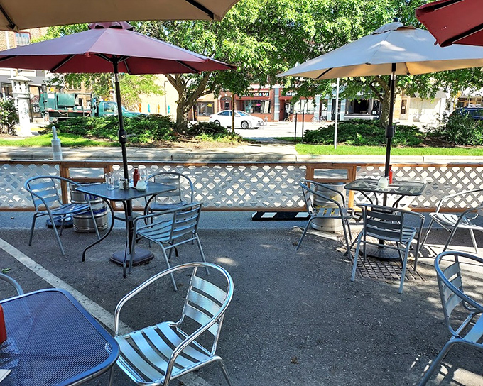 The patio at Alchemy doesn't just offer fresh air&mdash;it offers front-row seats to the neighborhood's daily rhythm and perfect burger-watching opportunities.