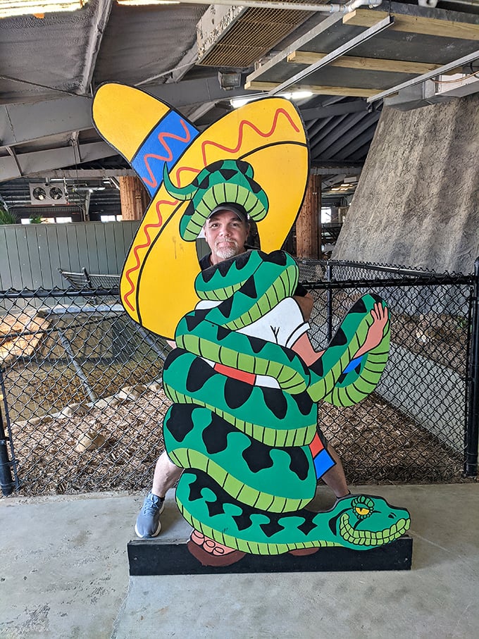 Strike a pose with this snake-charmer cutout board, where everyone becomes an instant roadside attraction star.