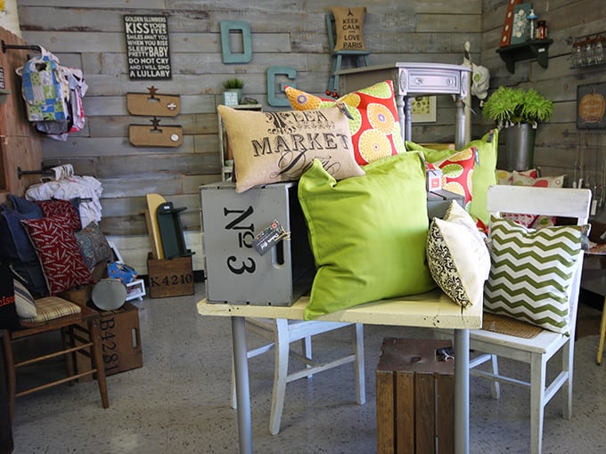 Upcycling at its finest! These repurposed chairs showcase how yesterday's castoffs become today's must-haves with a little imagination and colorful fabric.