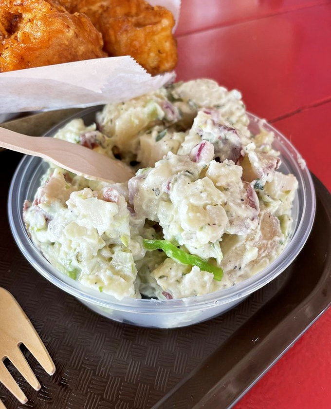 This potato salad isn't just a side dish &ndash; it's the supporting actor that deserves its own Oscar. Creamy, chunky perfection that complements the seafood stars.