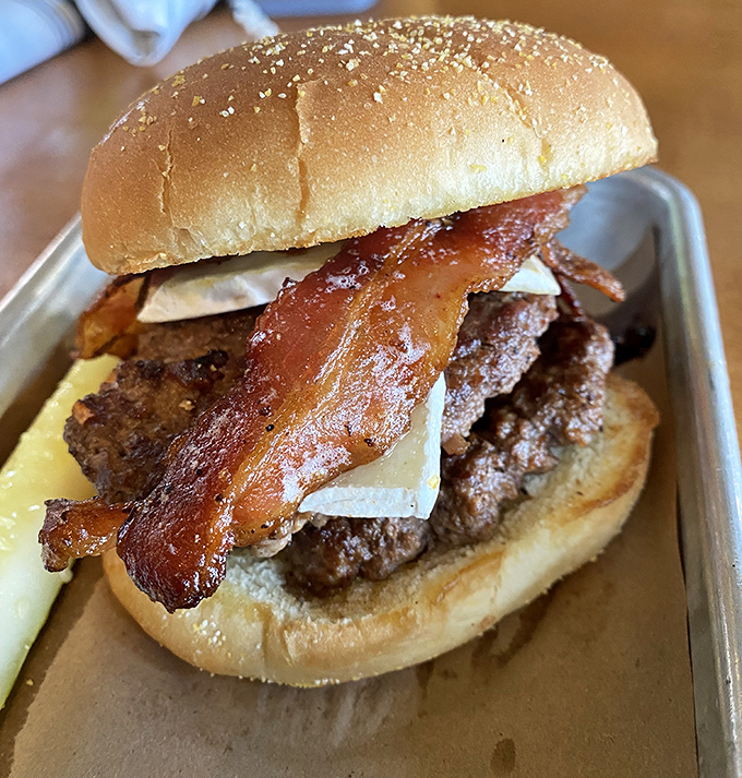 This burger isn't messing around. That bacon is doing exactly what bacon should do—stealing the show while making everything around it better.