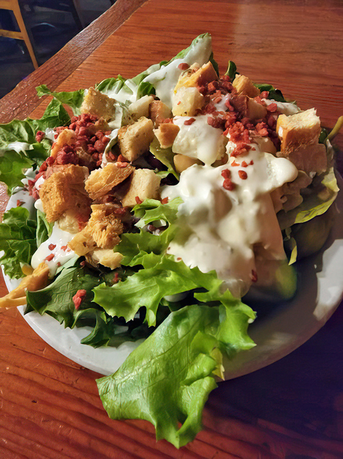 A salad that actually deserves your attention, with crisp greens, homemade croutons, and dressing that wasn't born in a bottle.