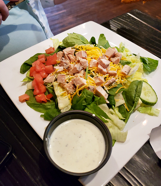 A salad that actually makes you forget you're eating healthy&mdash;fresh greens, protein, and a dressing worth bottling and taking home.