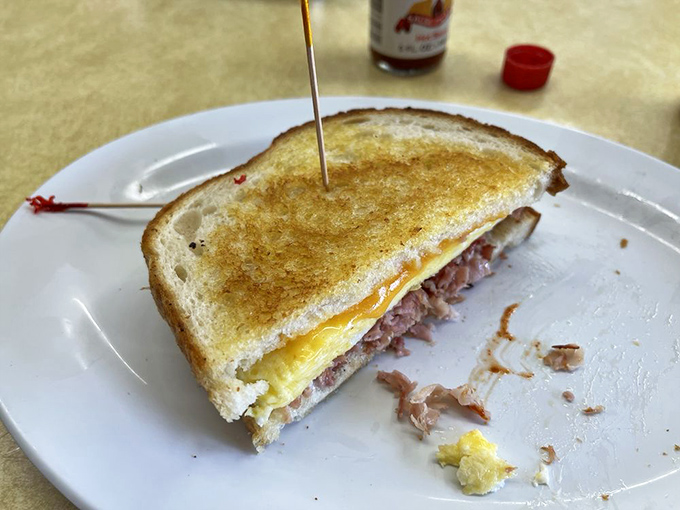 The humble ham and egg sandwich&mdash;proof that sometimes the simplest combinations create the most profound breakfast experiences.