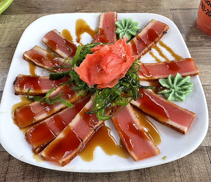 Sashimi so fresh it practically swims onto your plate, a testament to oceanic excellence.