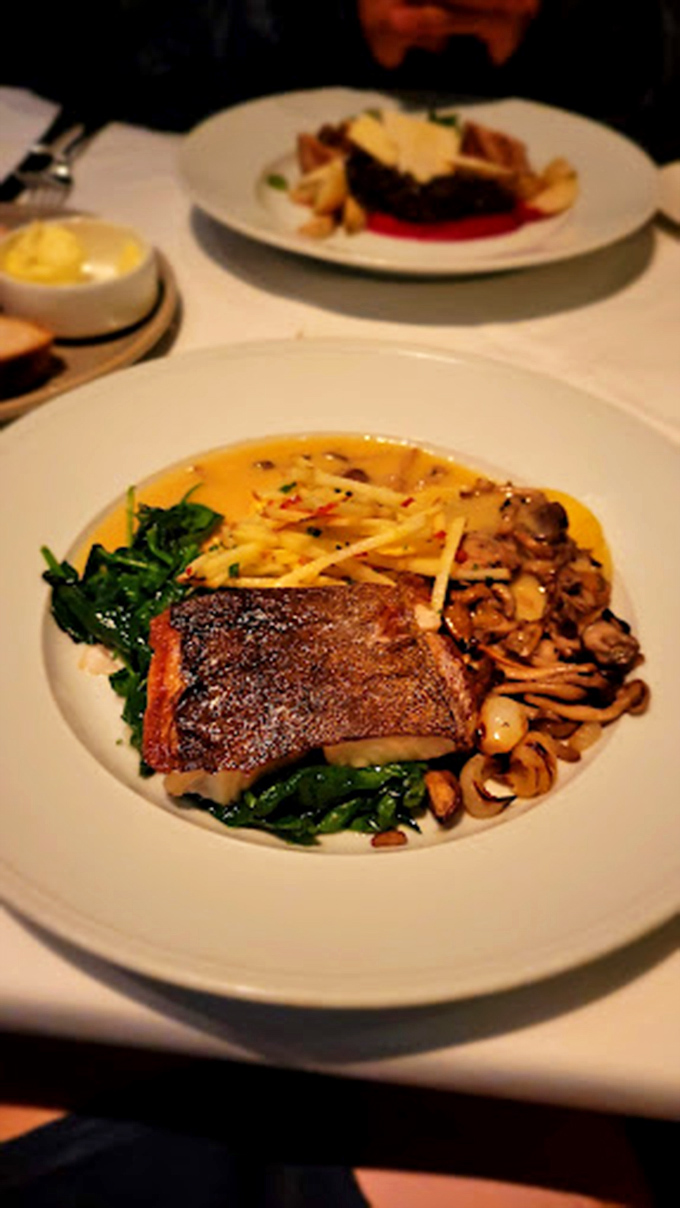 Sea bass with skin so perfectly crisped it deserves its own fan club. Those mushrooms aren't sidekicks&mdash;they're co-stars in this delicious drama.