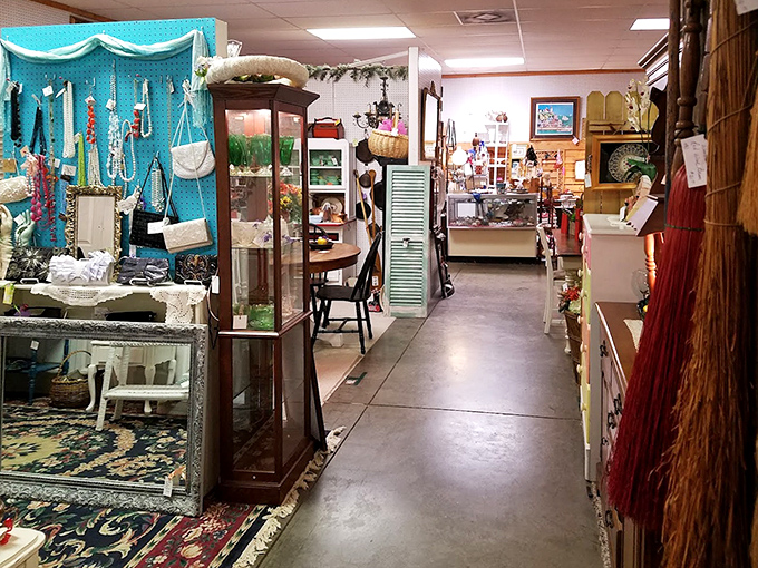 Vendor spaces create miniature museums where jewelry cases neighbor vintage textiles, creating unexpected conversations between unrelated treasures.