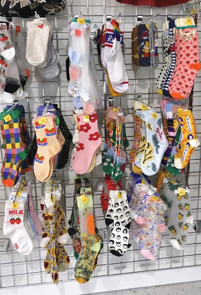 Colorful socks bring joy to feet everywhere, one rainbow stripe at a time.