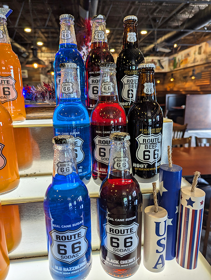 Route 66 sodas lined up like liquid nostalgia in bottles. Blue Razzleberry might not be historically accurate, but it's deliciously anachronistic.