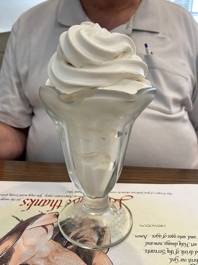 Soft serve ice cream that towers like the Washington Monument but disappears faster than your willpower in its presence.