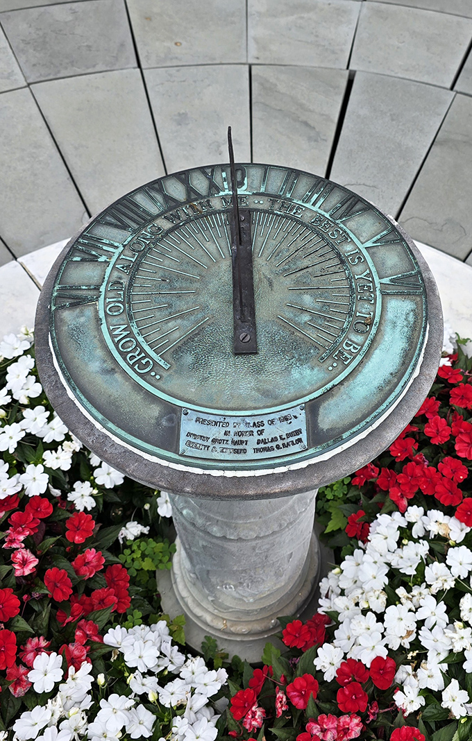 Time stands still at Grey Towers, but this elegant sundial keeps track anyway. Surrounded by seasonal blooms, it's both functional art and garden centerpiece.